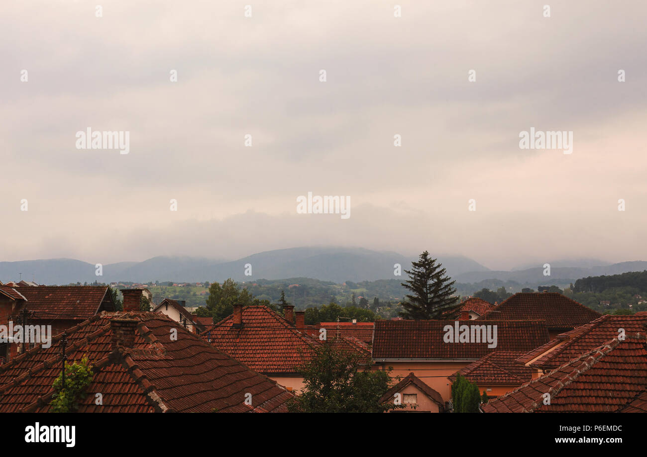 Rainy summer day over small Balkan town Stock Photo - Alamy