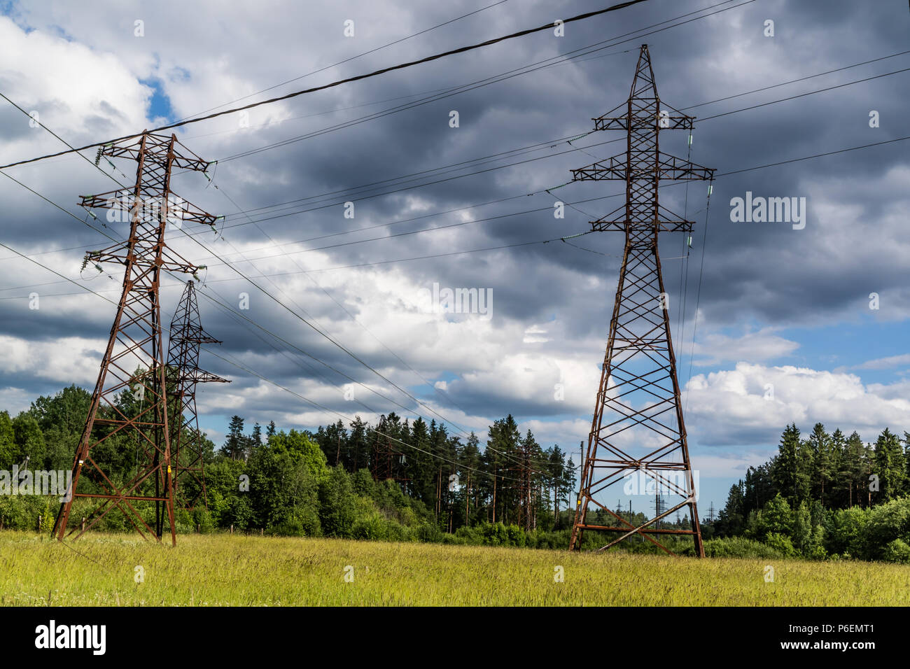 Power line towers and wires. Sunny day Stock Photo - Alamy
