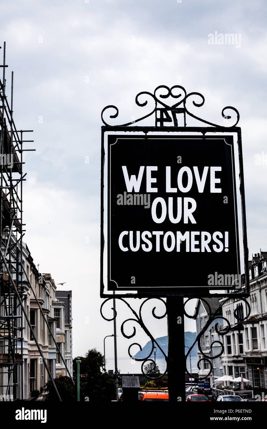 Handwriting text writing We Love Our Customers Call. Concept meaning ...