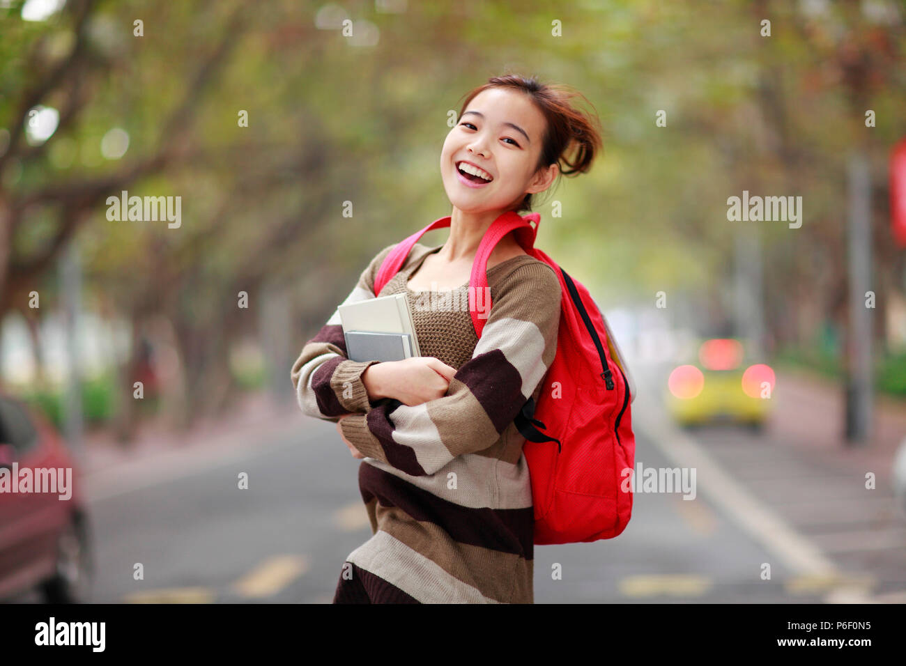 one female asian college student in campus Stock Photo - Alamy