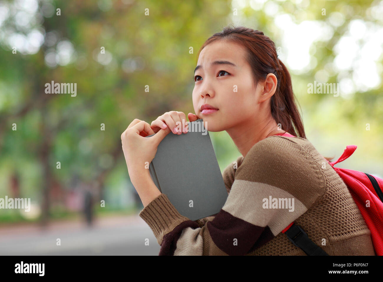 one female asian college student in campus Stock Photo - Alamy
