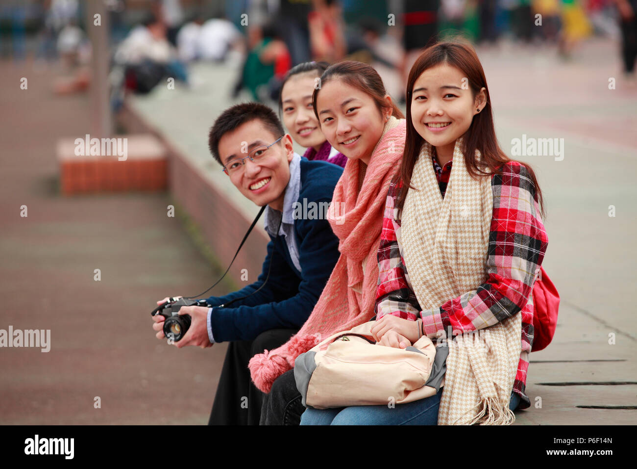 four asian college students in campus Stock Photo - Alamy