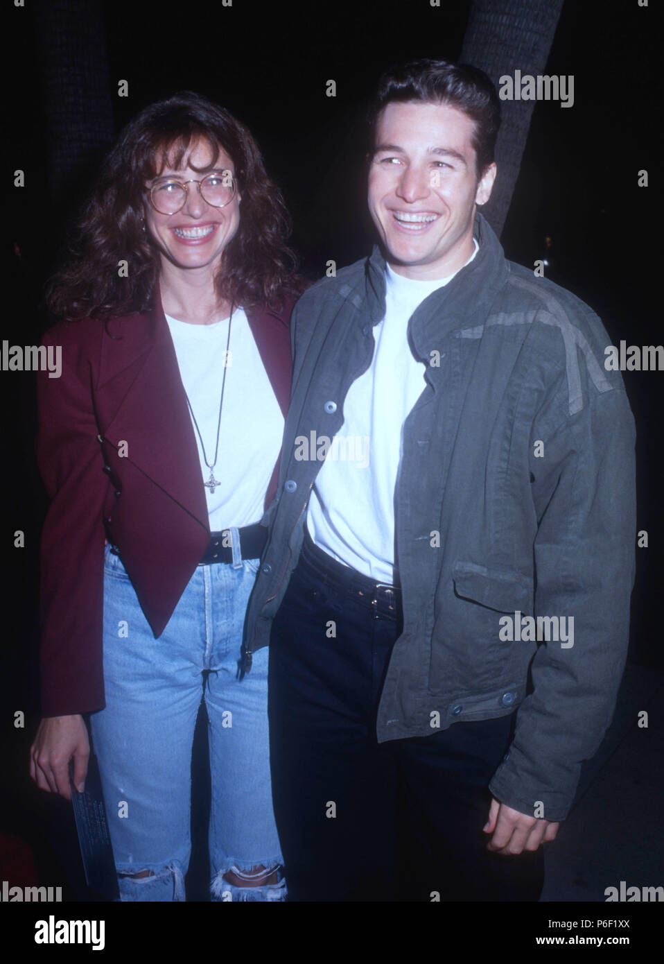 BEVERLY HILLS, CA - DECEMBER 12: (L-R) Actress Mimi Rogers and brother ...