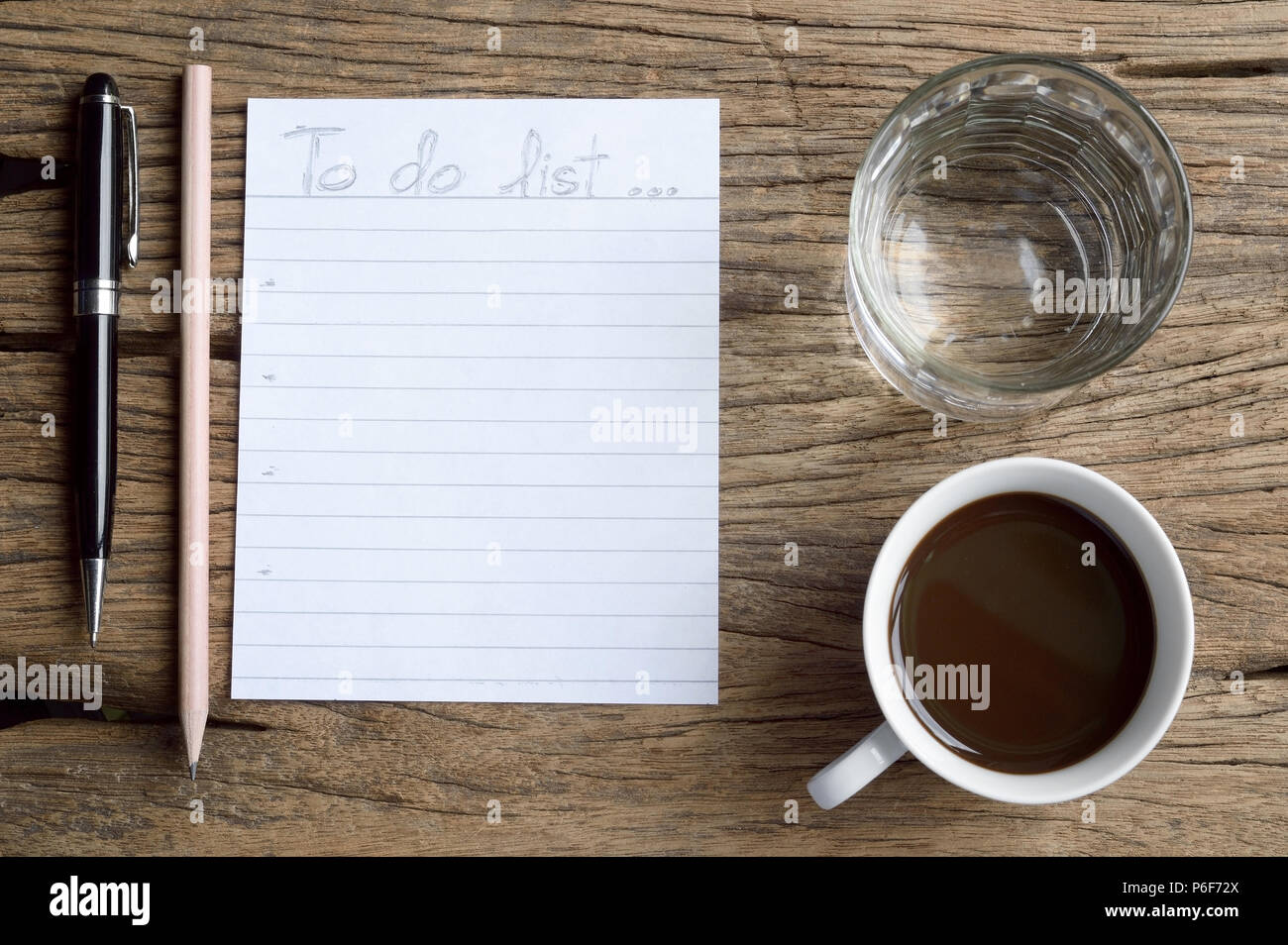 to do list word on wooden table with coffee cup, drinking water, pencil ...