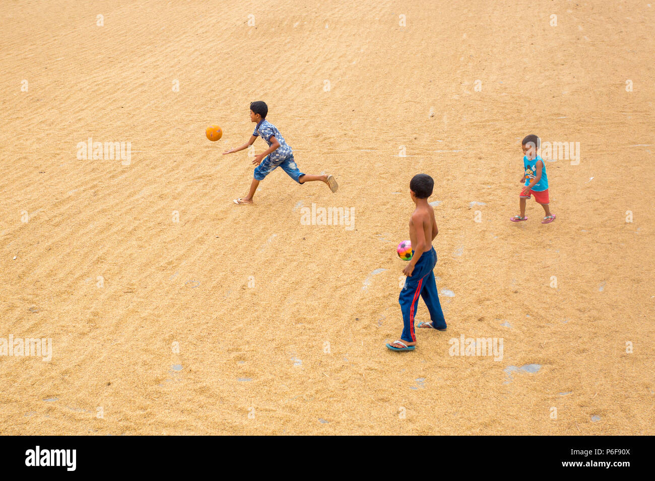 Children playing in rice field hi-res stock photography and images - Alamy