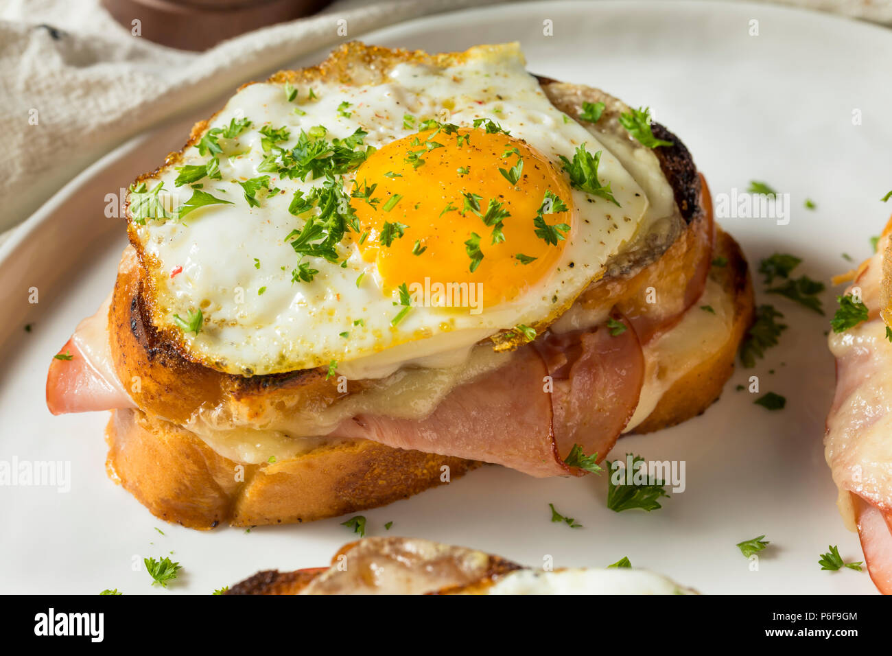 Homemade French Croque Madame Sandwich with Ham and Cheese Stock Photo ...