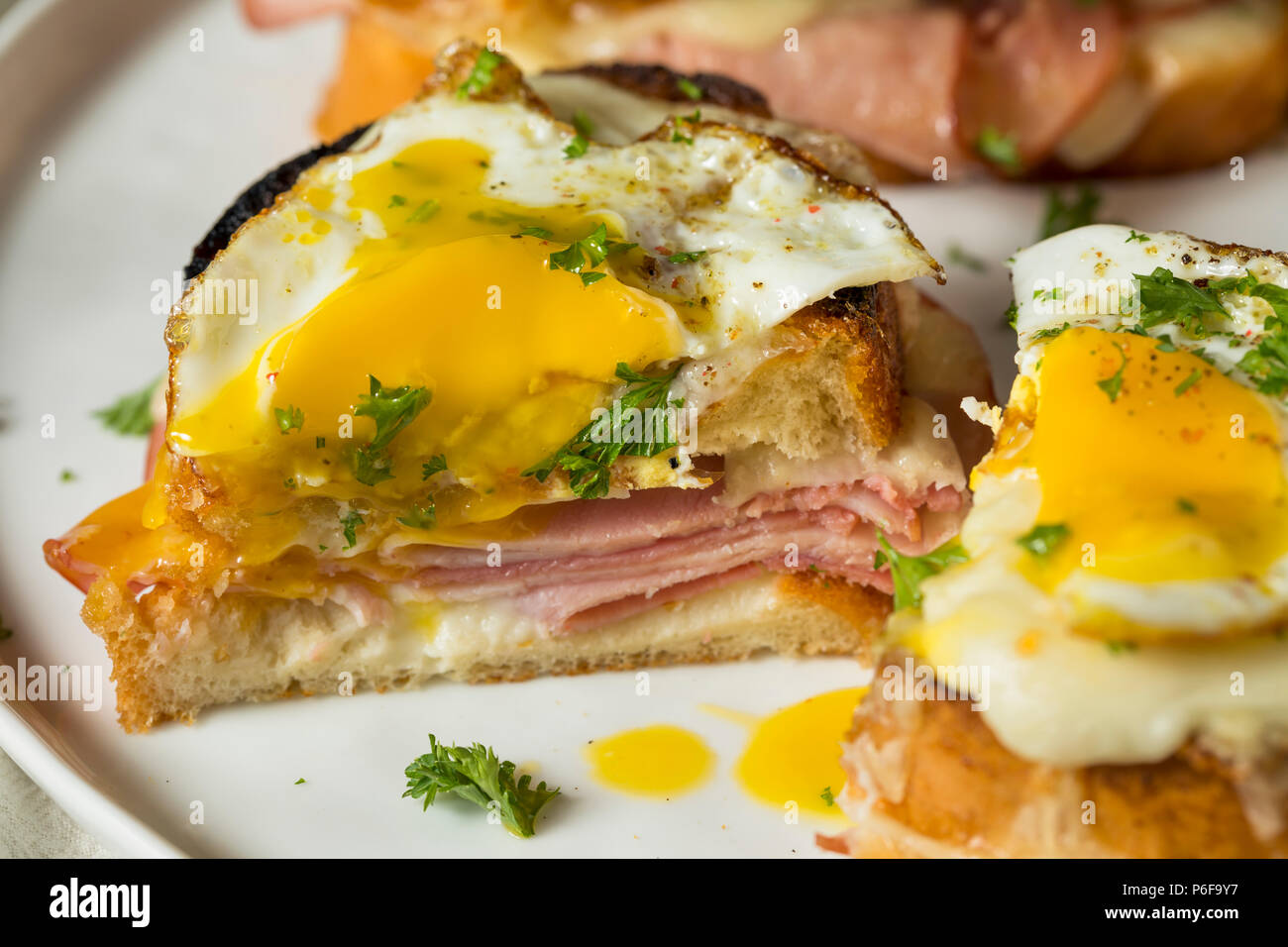 Homemade French Croque Madame Sandwich with Ham and Cheese Stock Photo ...