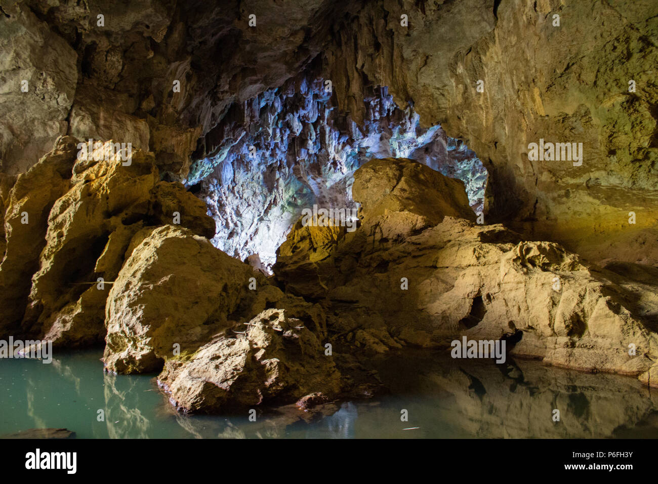 standing inside the cave surrounding by water Stock Photo - Alamy