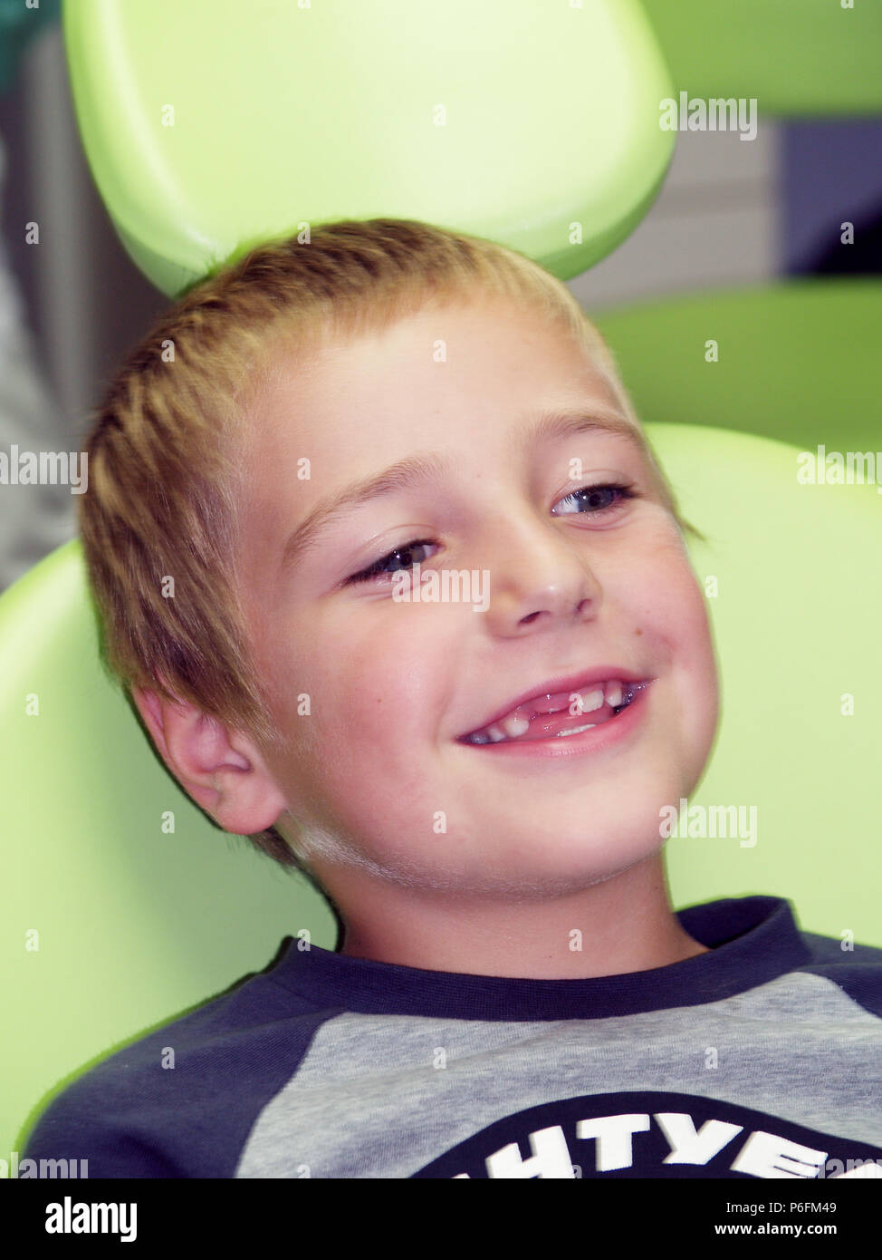 Edentulous boy on dental prevention examination Stock Photo - Alamy