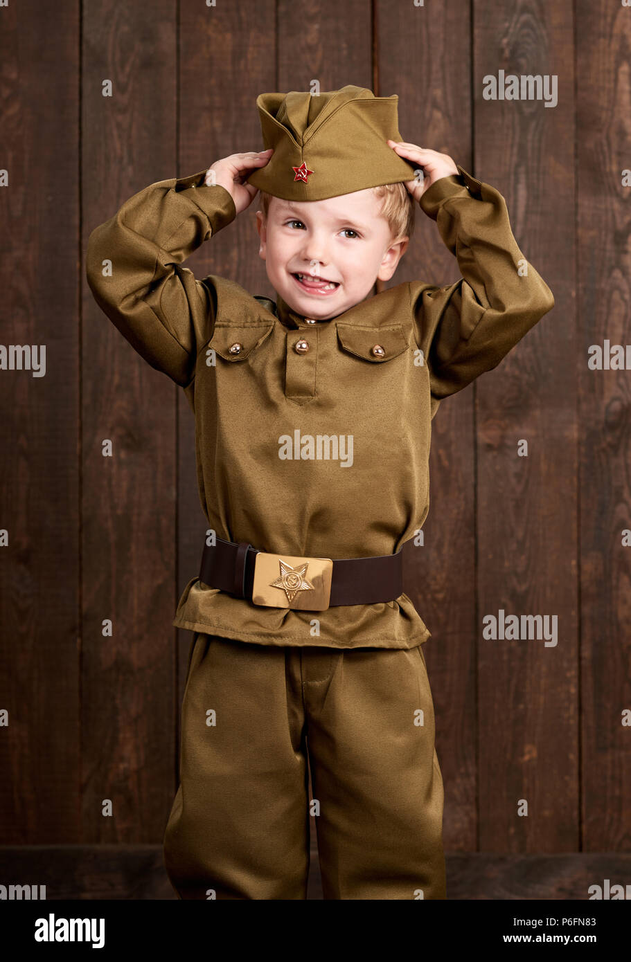 children are dressed as soldier in retro military uniforms Stock Photo ...