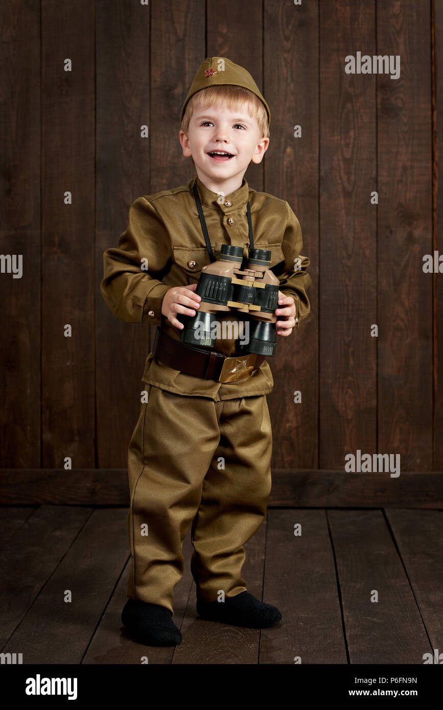 children are dressed as soldier in retro military uniforms Stock Photo ...