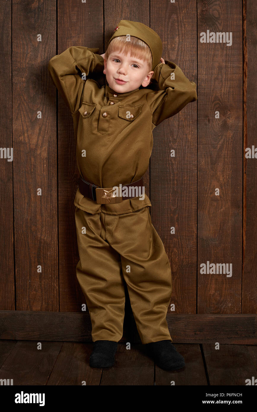 children are dressed as soldier in retro military uniforms Stock Photo ...