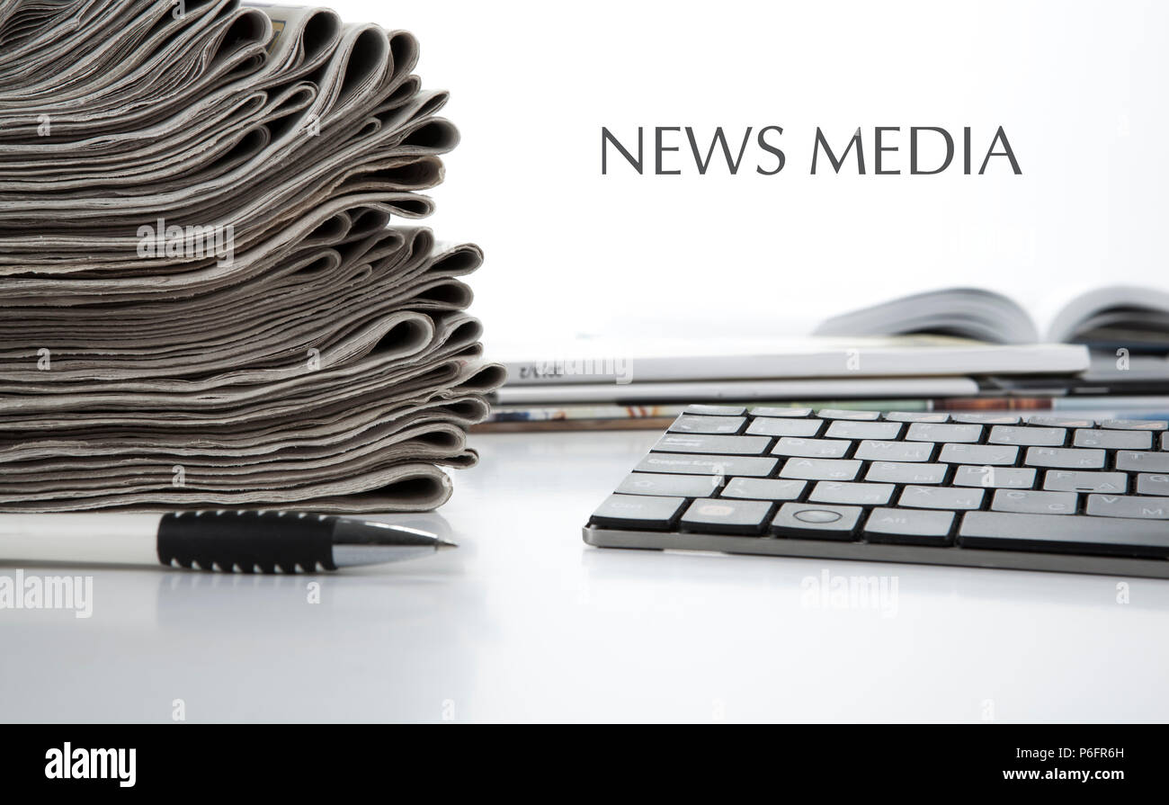 Newspapers on keyboard laptop hi-res stock photography and images - Alamy