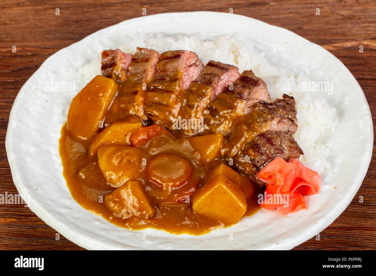 Curry with chili, beef, rice Stock Photo - Alamy
