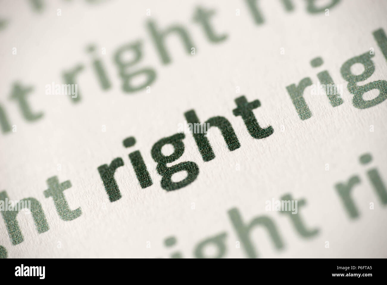 word right printed on white paper macro Stock Photo - Alamy