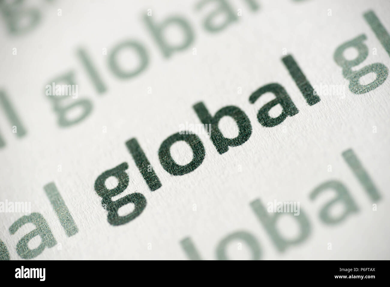word global printed on white paper macro Stock Photo - Alamy