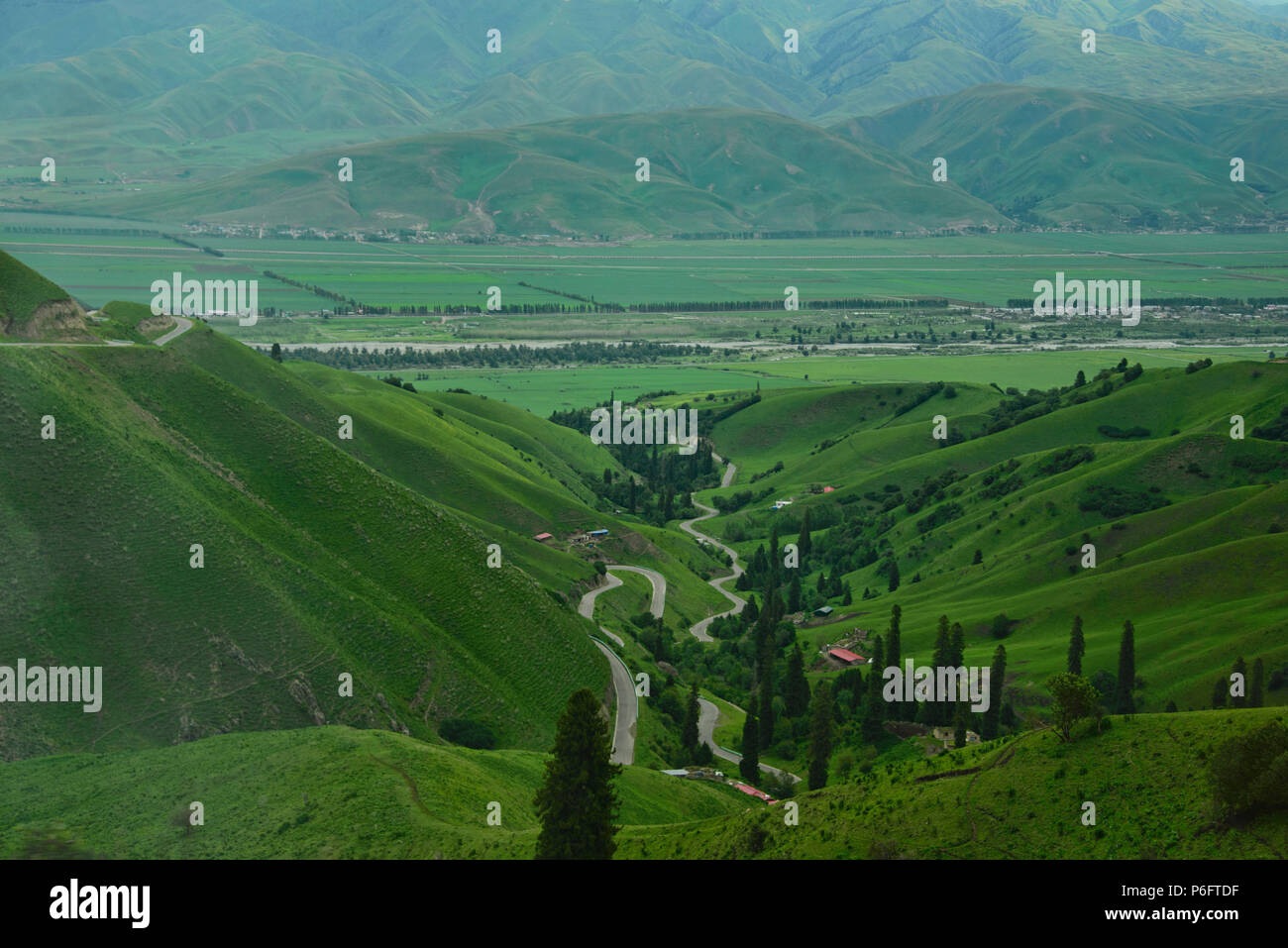 Road into the Tian Shan Mountains, Narat Grasslands, Xinjiang, China ...