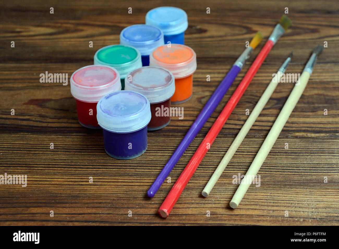 Gouache colors and brushes are ready for painting Stock Photo - Alamy