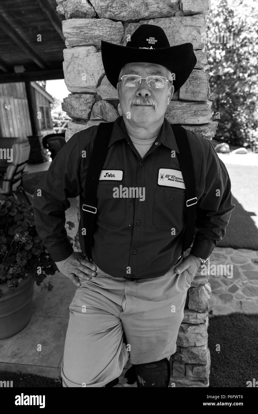 Pest control man spraying pesticide Black and White Stock Photos ...