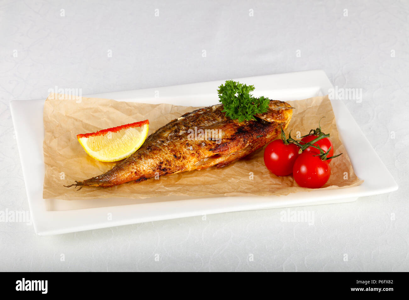 Roasted dorada fish Stock Photo - Alamy