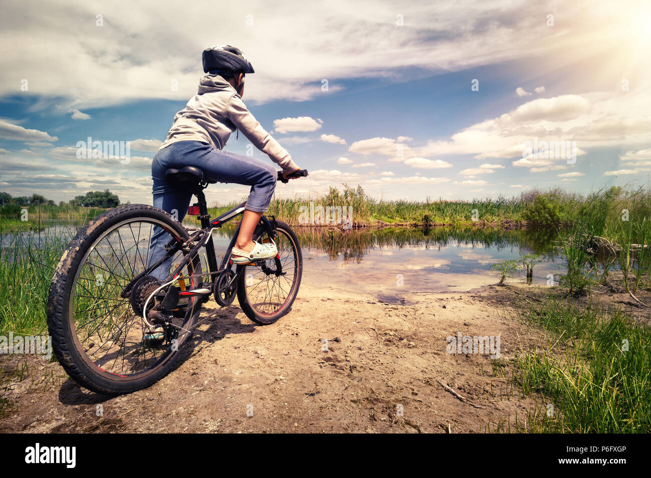 Bright sun with cyclist hi-res stock photography and images - Alamy
