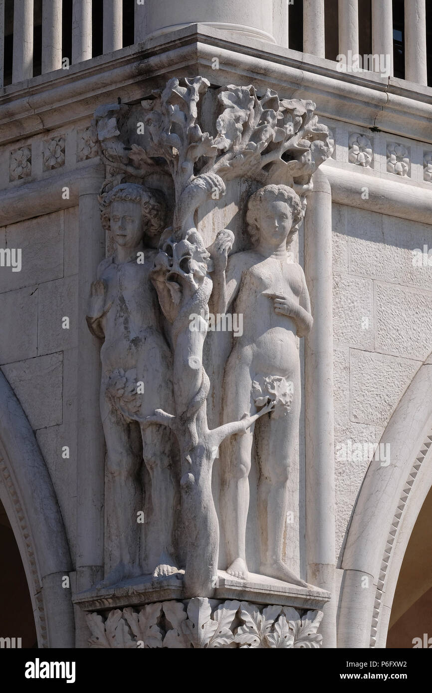 Detail of the Doge Palace with statues of Adam and Eve, St. Mark Square ...