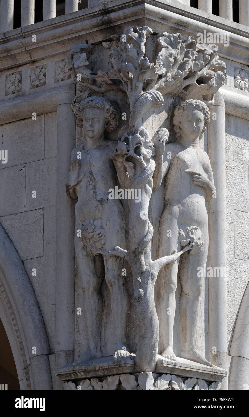 Detail of the Doge Palace with statues of Adam and Eve, St. Mark Square ...
