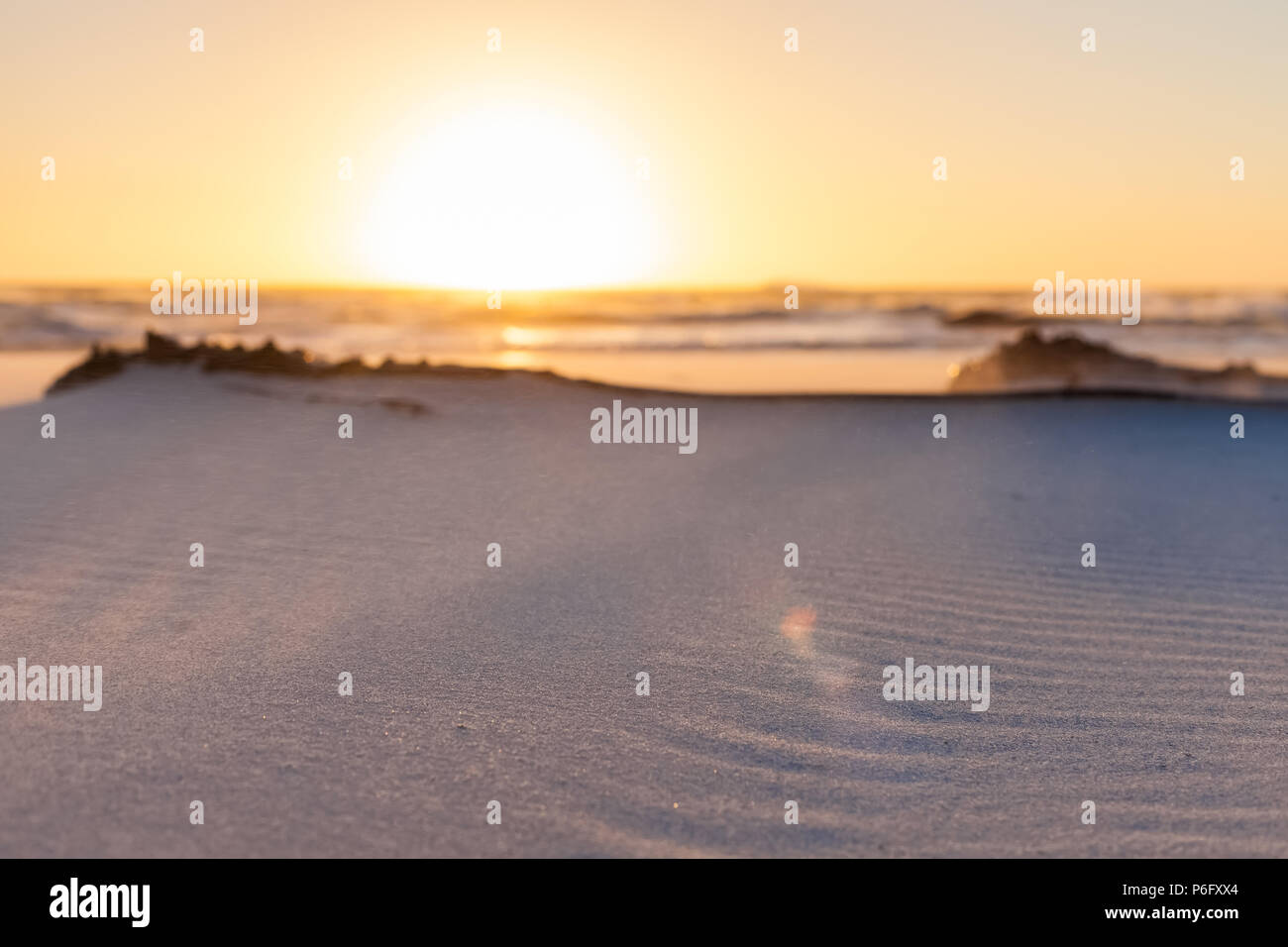 Coastal white beach sand with ripples and waves texture pattern for ...