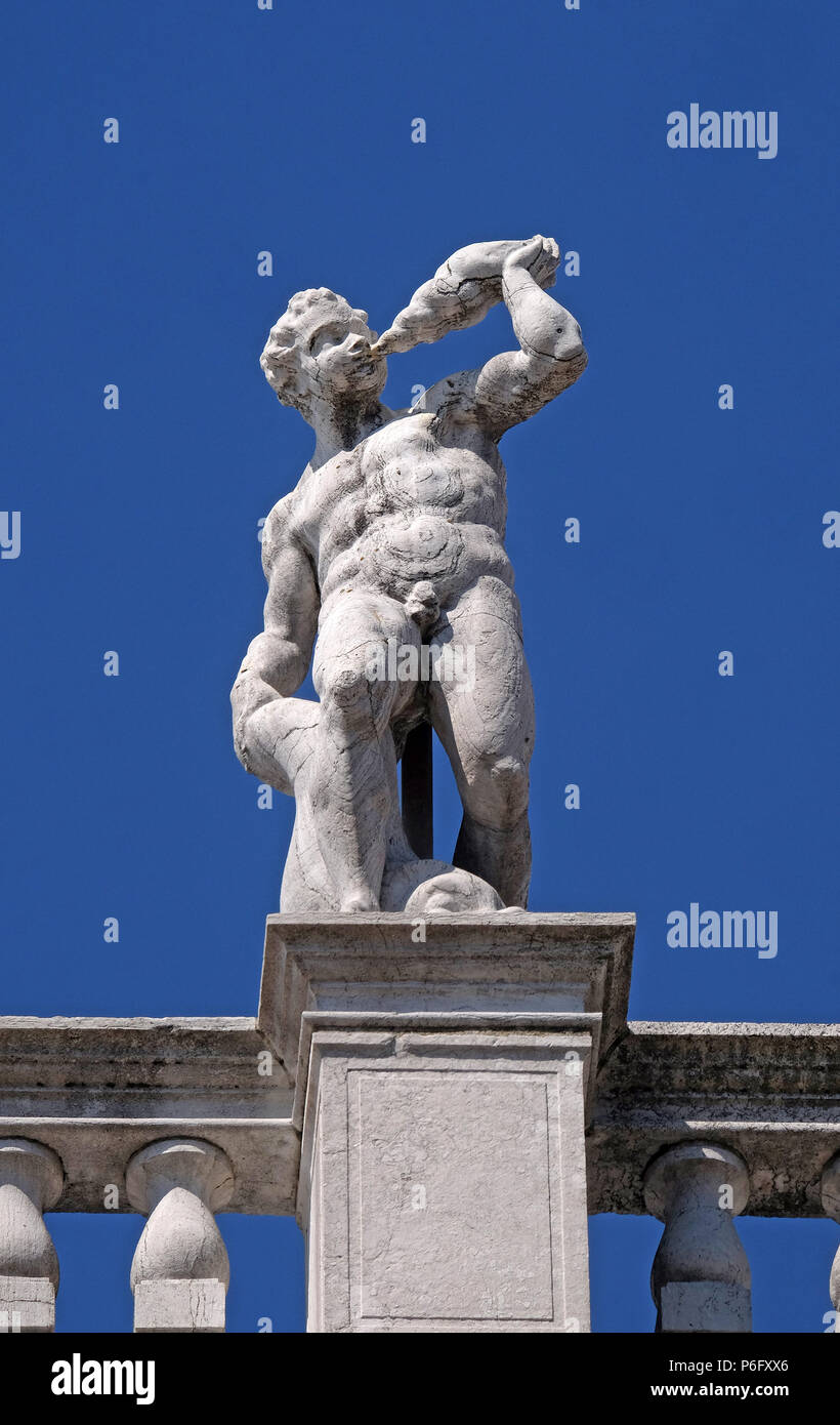 Statue at the top of National Library of St Mark`s Biblioteca Marciana ...