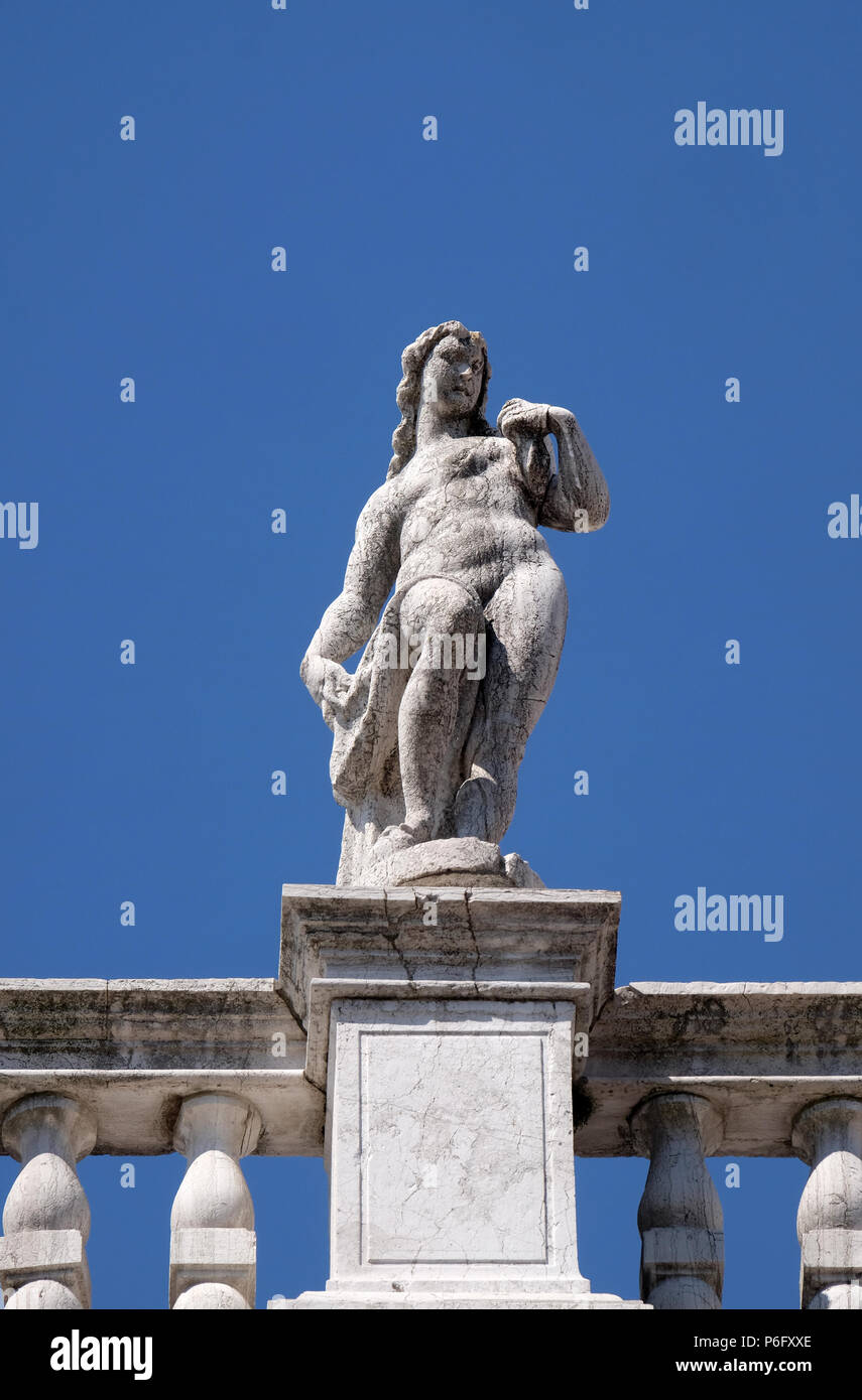 Statue at the top of National Library of St Mark`s Biblioteca Marciana ...