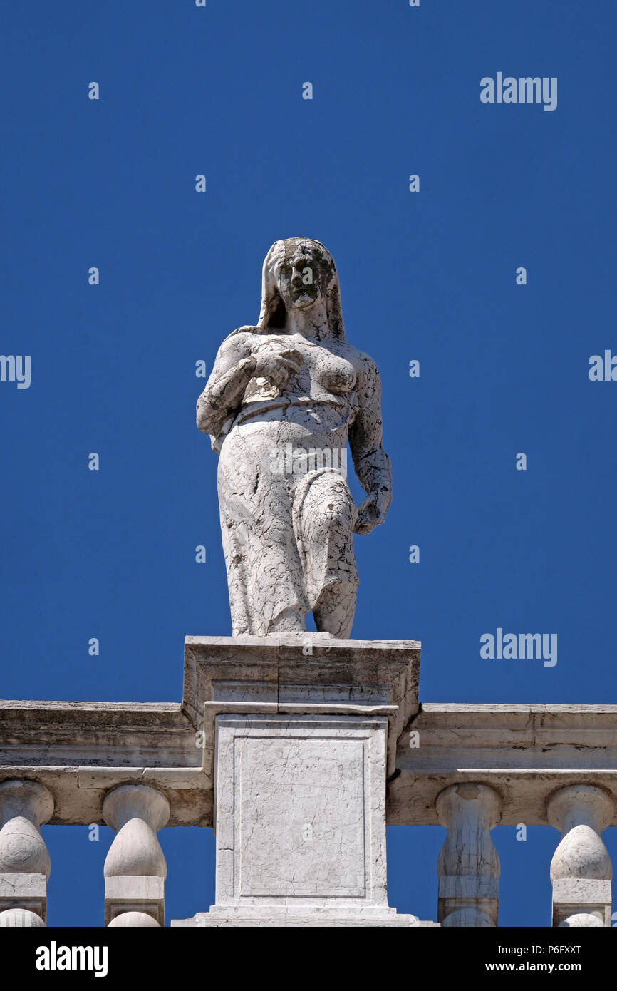 Statue at the top of National Library of St Mark`s Biblioteca Marciana ...