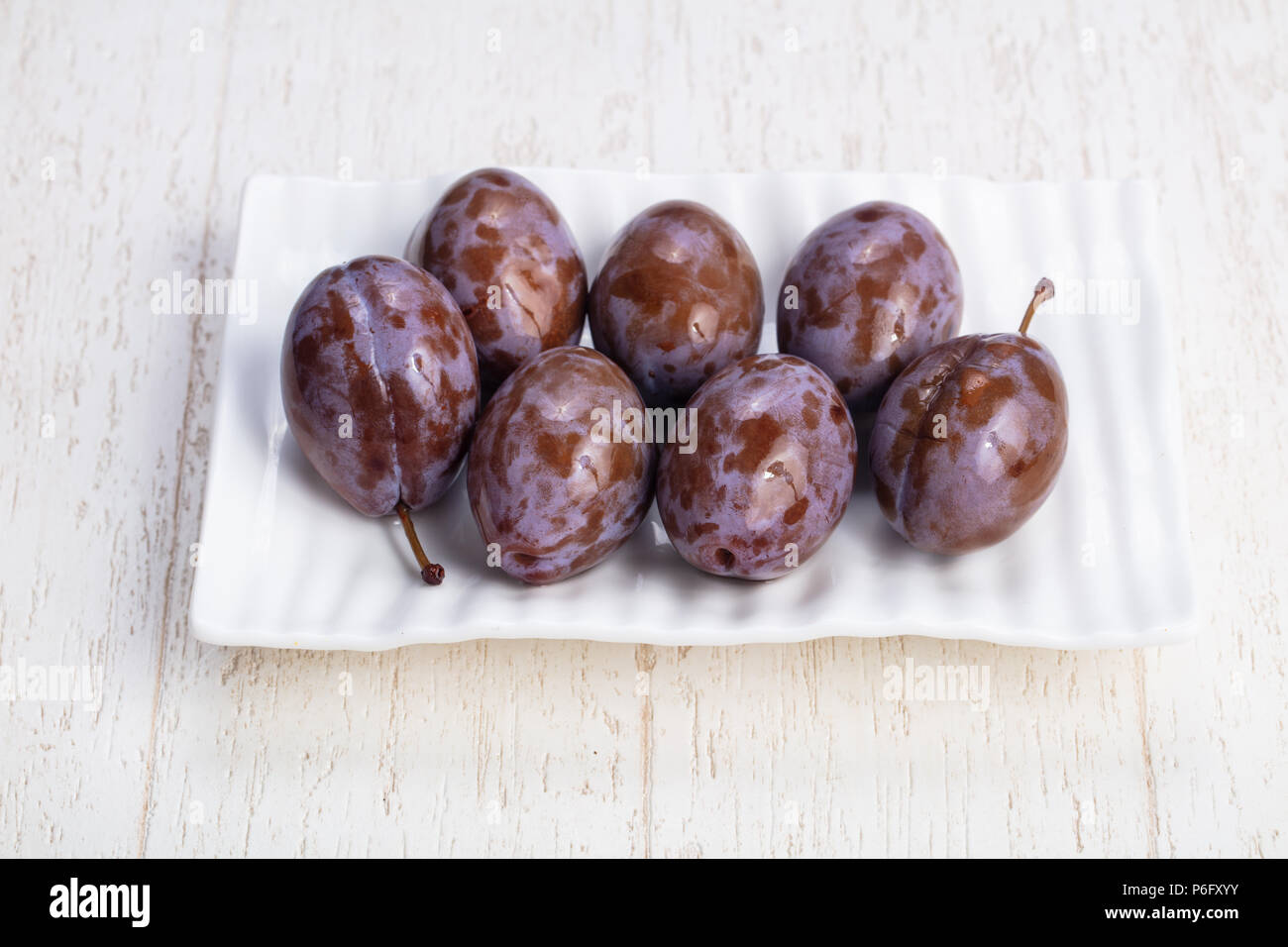 Tasty fresh sweet blue plums Stock Photo - Alamy