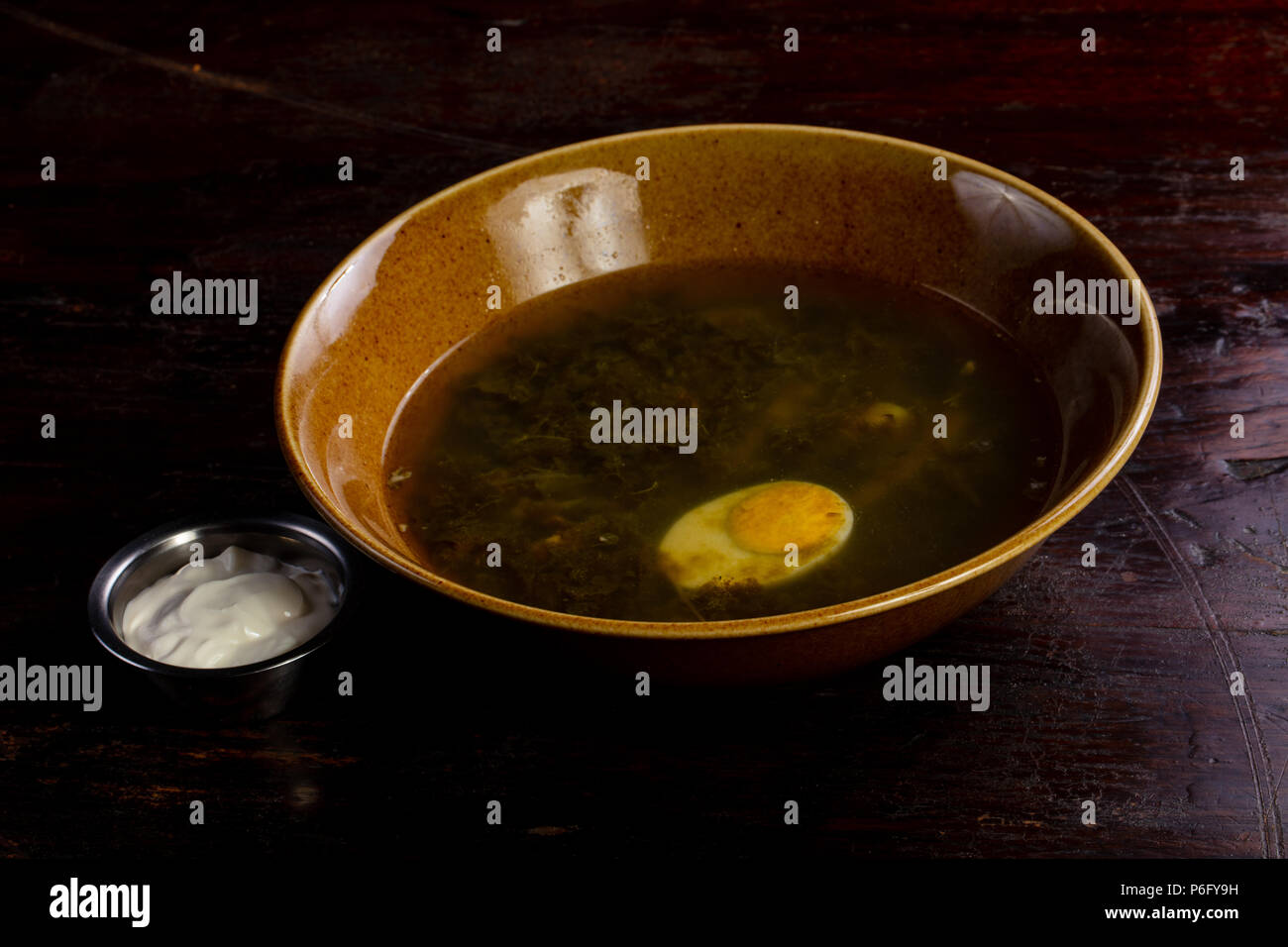 Summer Sorrel soup with egg Stock Photo - Alamy