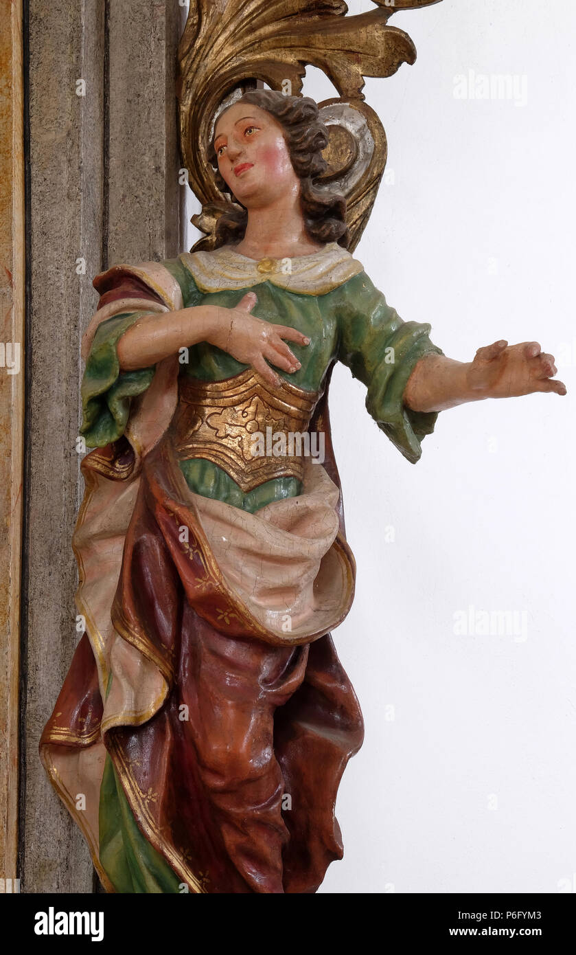 Statue of Saint Catherine of Alexandria on the altar of Our Lady in the ...