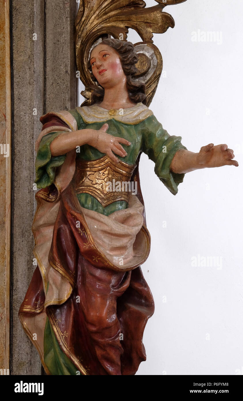 Statue of Saint Catherine of Alexandria on the altar of Our Lady in the ...