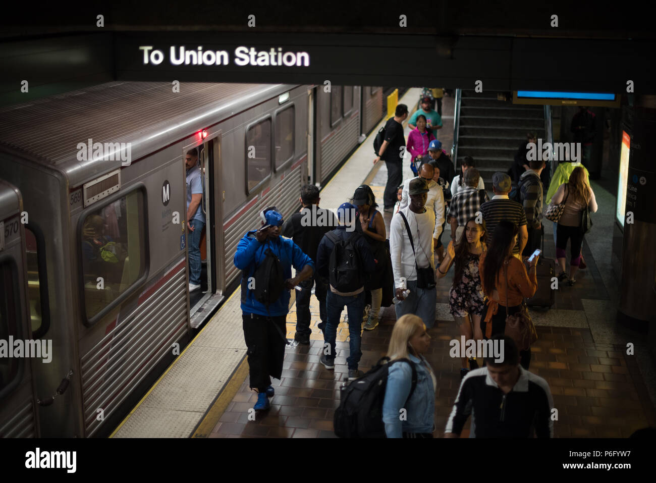 LOS ANGELES, CALIFORNIA - JUNE 29 2018: Commuters in subway station on ...