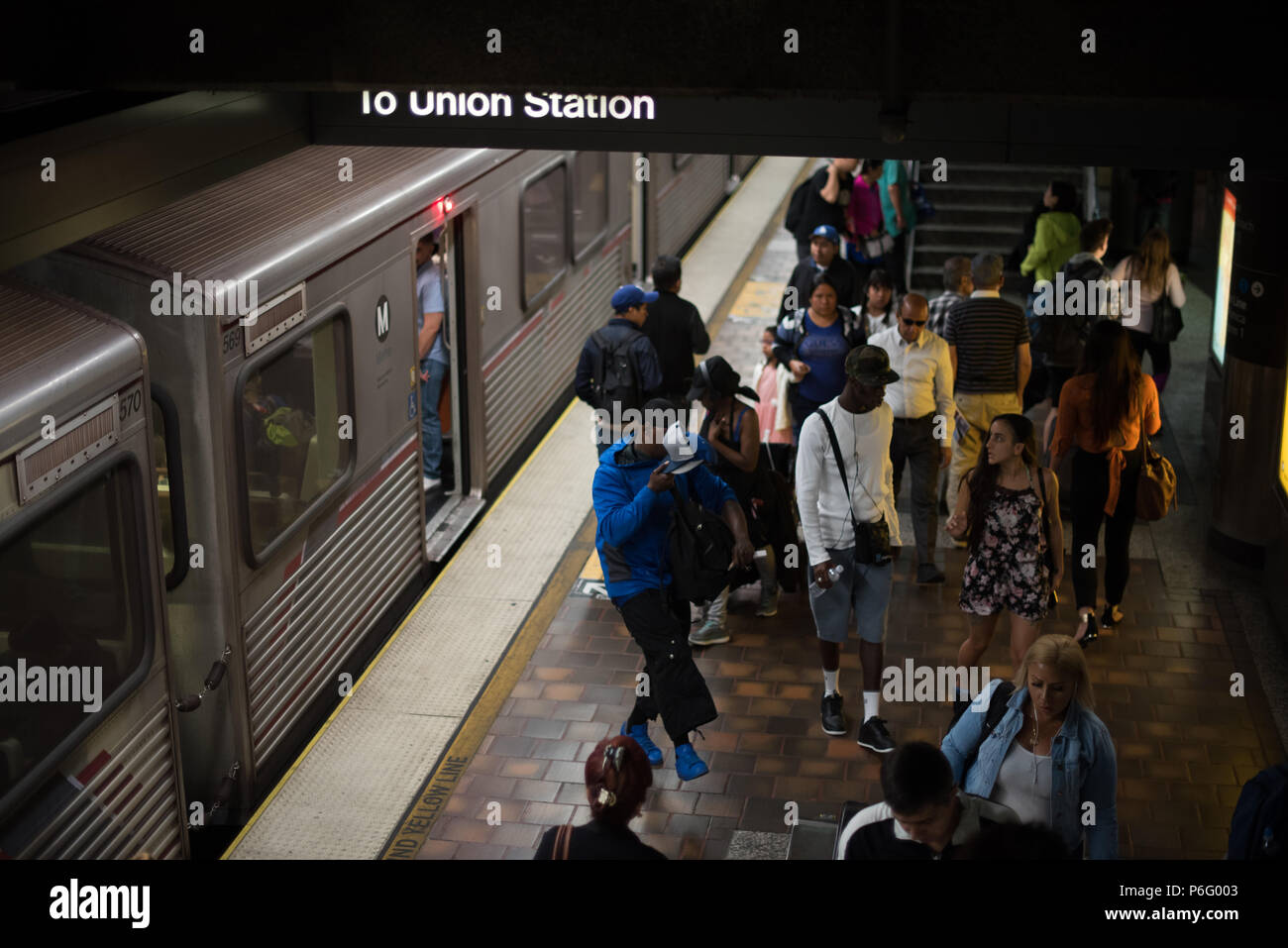 LOS ANGELES, CALIFORNIA - JUNE 29 2018: Commuters in subway station on ...