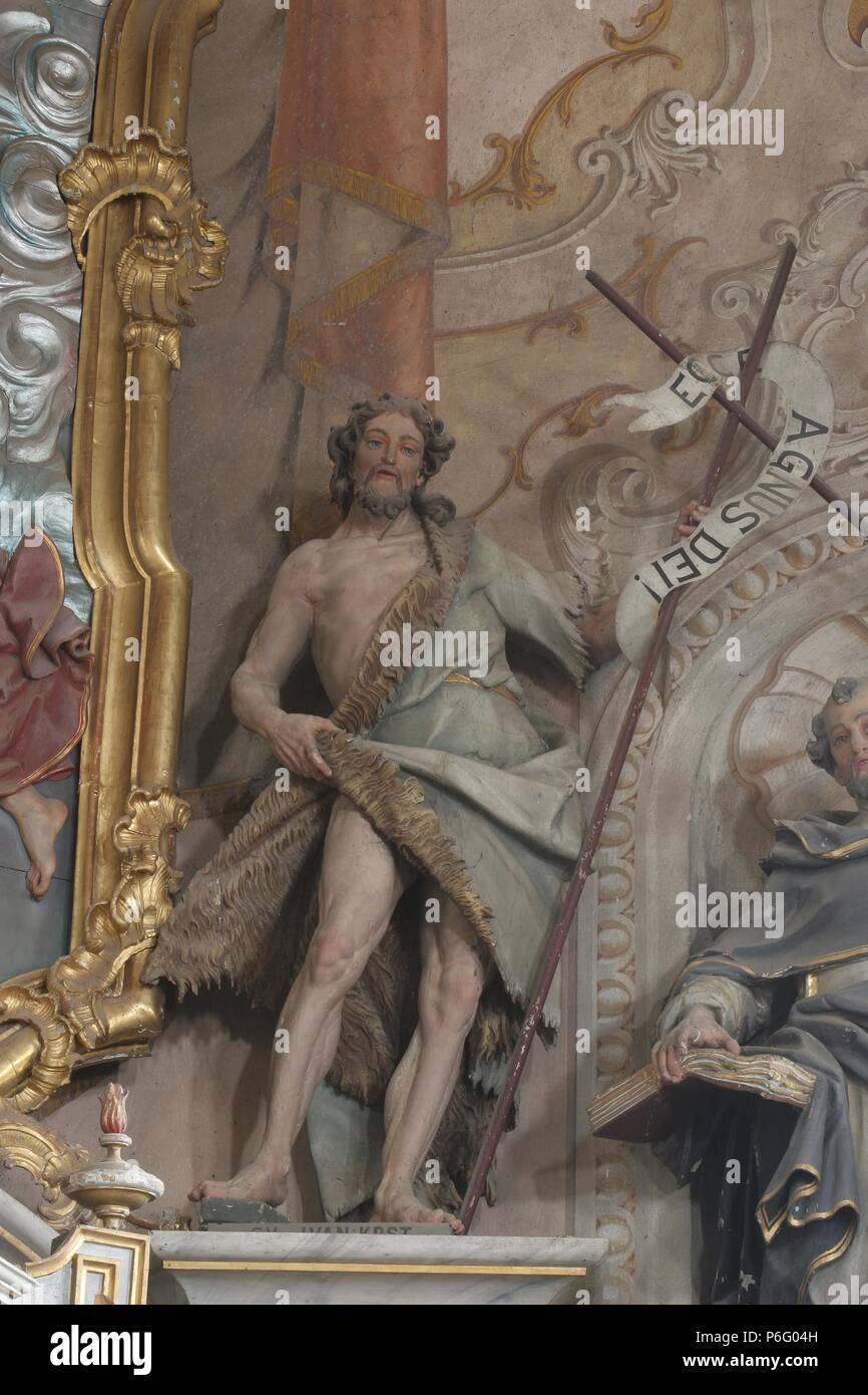 Saint John the Baptist, statue on the main altar in church of ...