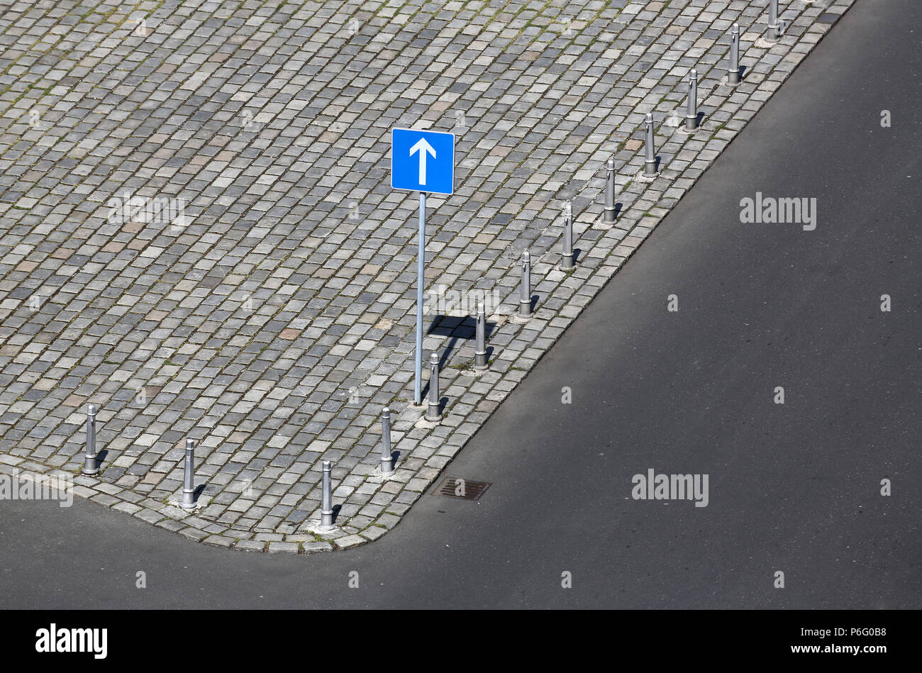 Road sign, one way traffic sign. Drive Straight Arrow Stock Photo - Alamy