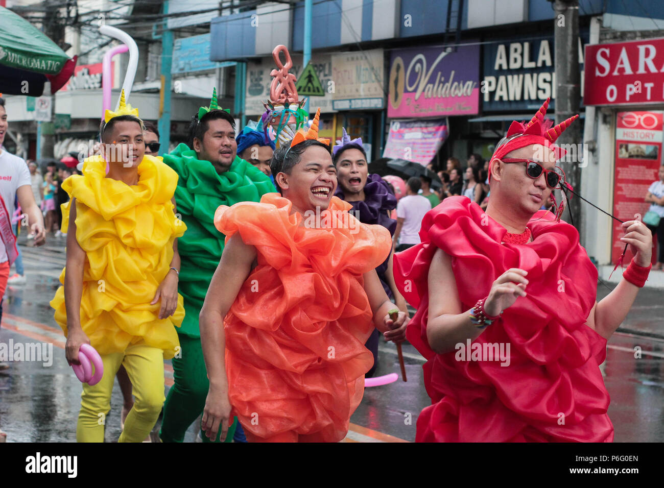 Members in their themed costumes during the march. Thousands gathered ...
