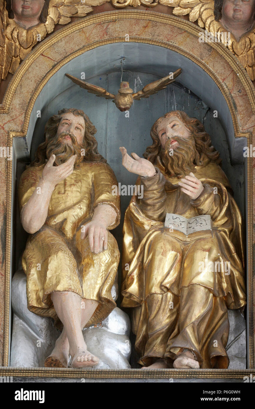 Holy Trinity, statue on the main altar in Church of Birth of Virgin ...