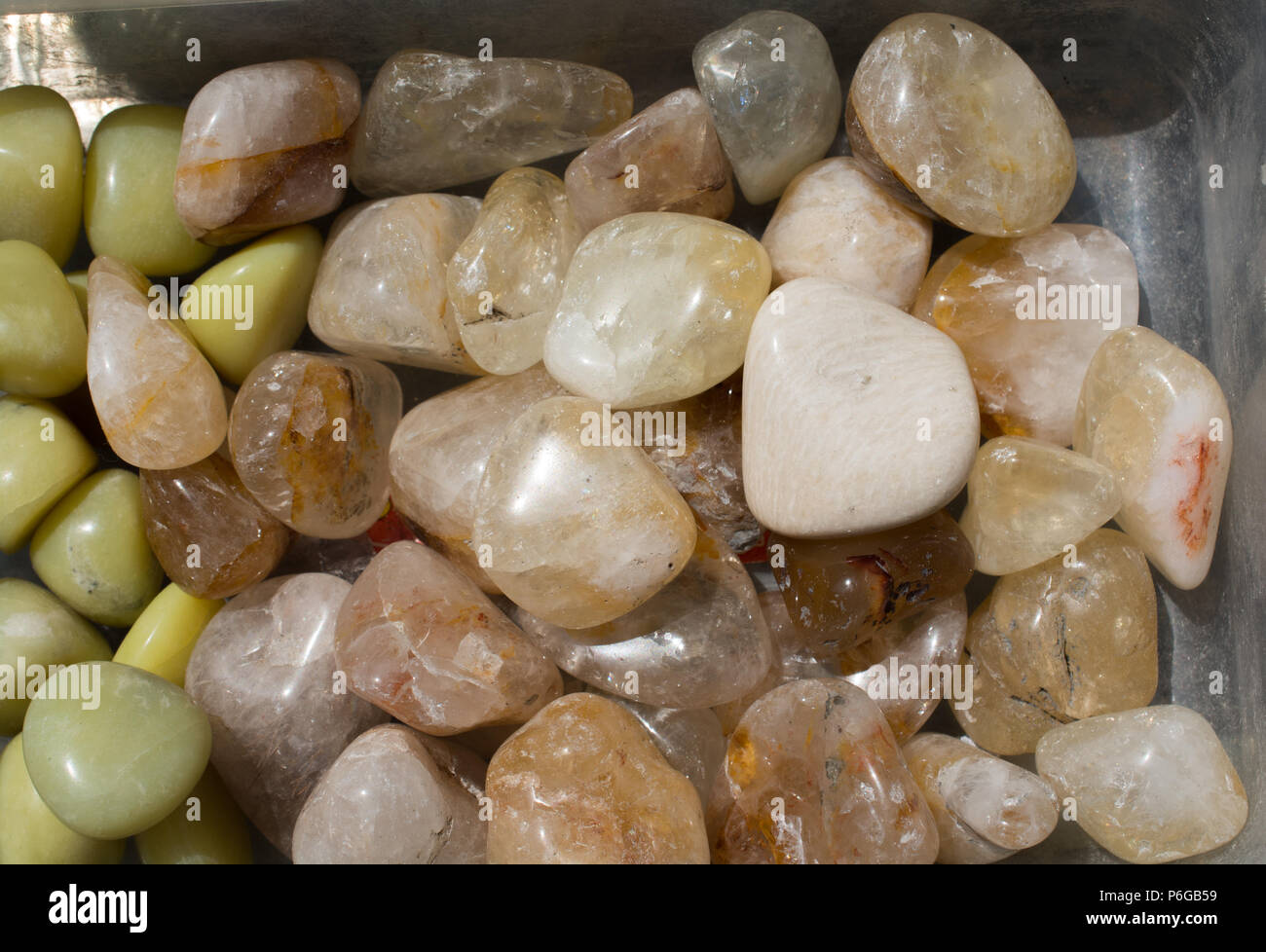Tumbled scitrine gem stone as mineral rock geode Stock Photo - Alamy