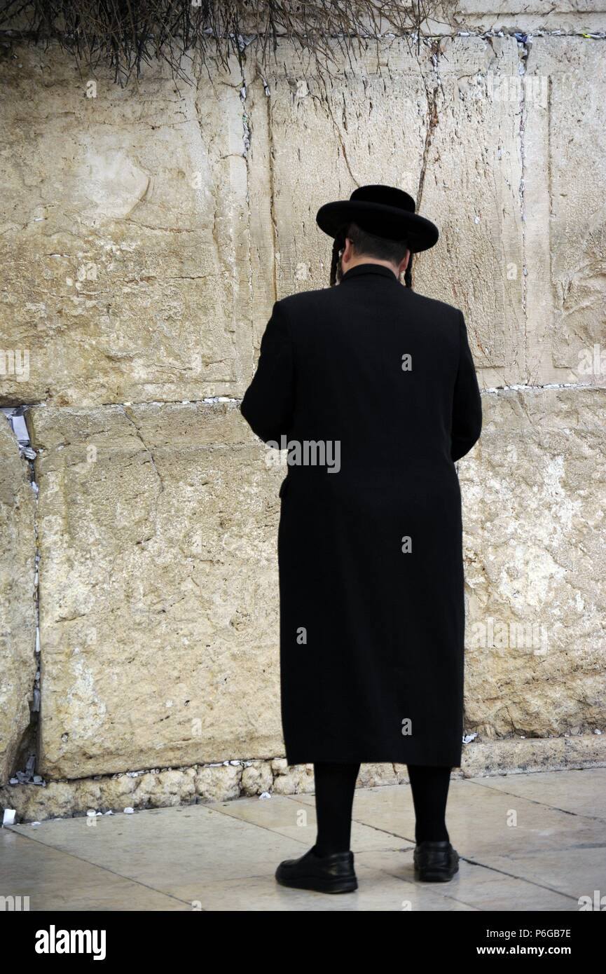 Haredi Judaism. Orthodox Judaism. A Jew praying at the Western Wall ...