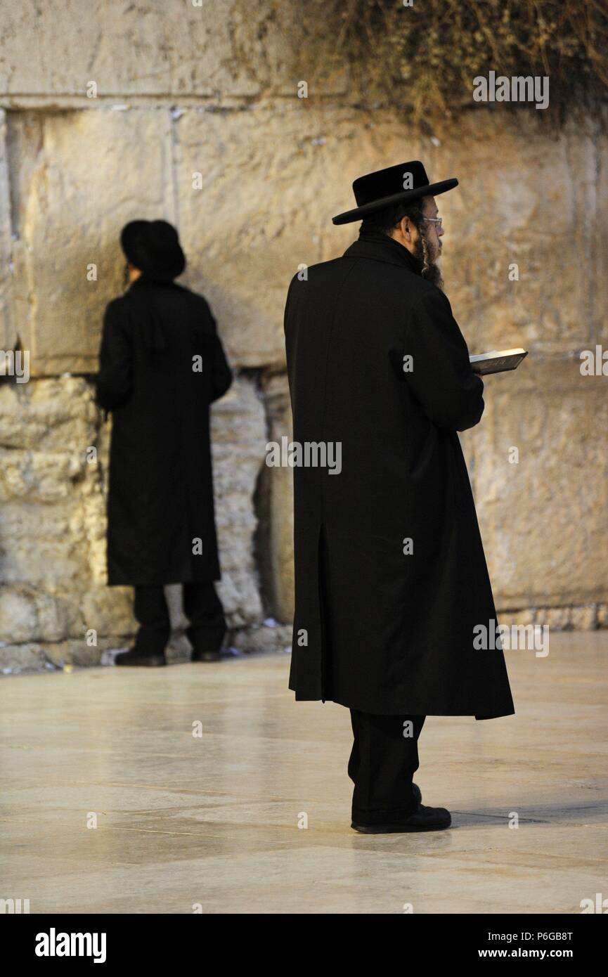 Haredi Judaism. Orthodox Judaism. A Jew praying at the Western Wall ...
