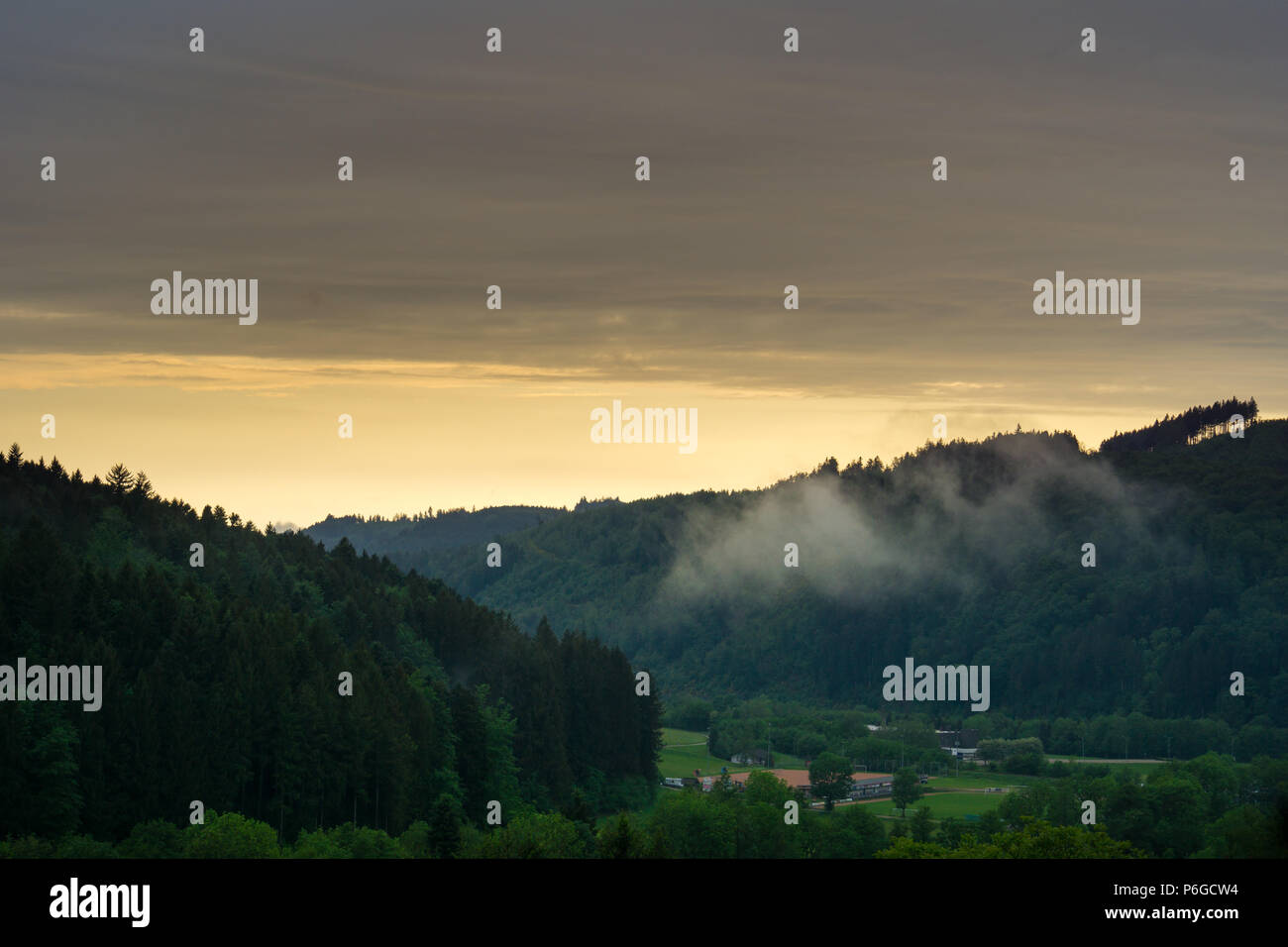Football pitch in black forest valley Stock Photo - Alamy