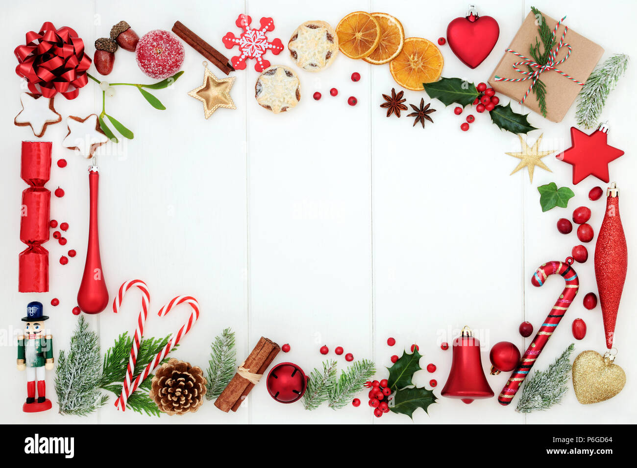 Christmas background border with traditional symbols of bauble ...