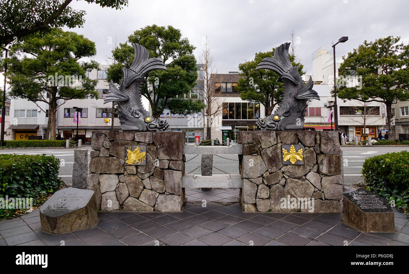 Himeji, Japan - Dec 27, 2015. Bronze statue of fish on street in Himeji ...