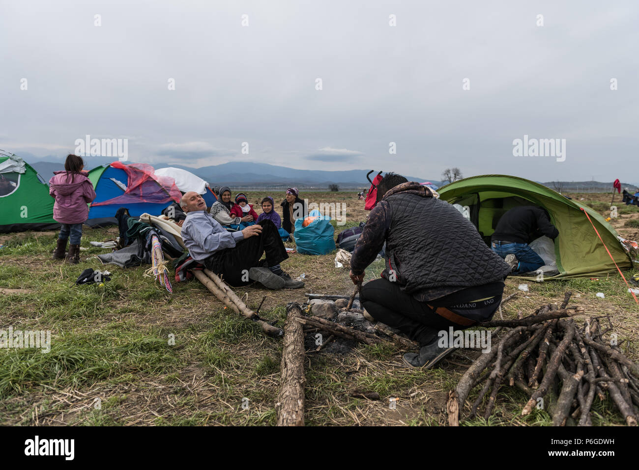 Refuge family rest at the makeshift camp of the Greek-Macedonian border ...