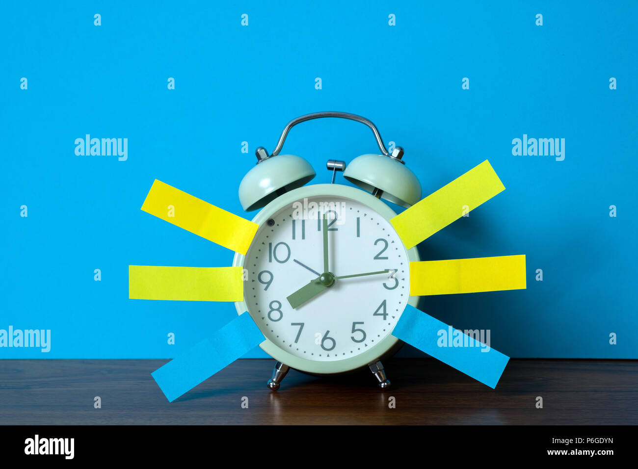 Post it note paper sticky and vintage alarm clock on table with copy ...