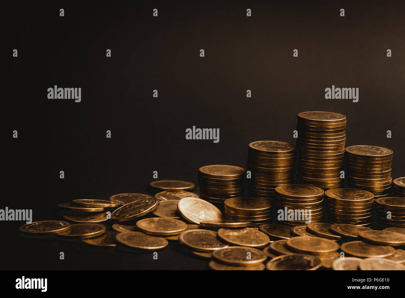 Savings, increasing columns of coins, piles of coins arranged as a ...